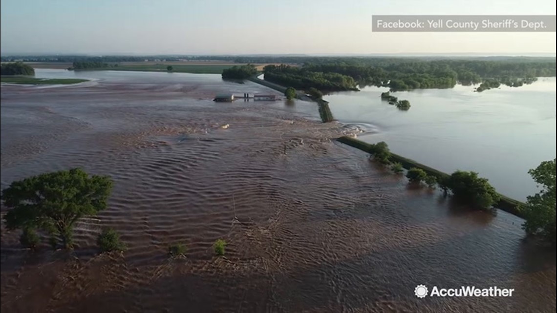 Drone captures water pouring over breached levee | kvue.com