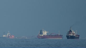 Container vessel attacked near Strait of Hormuz, British military says ...