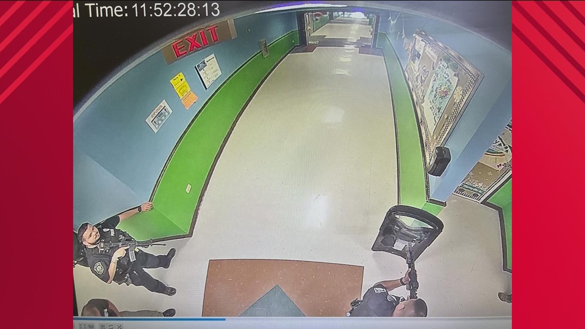 Uvalde surveillance image shows officers arrived with rifles within ...