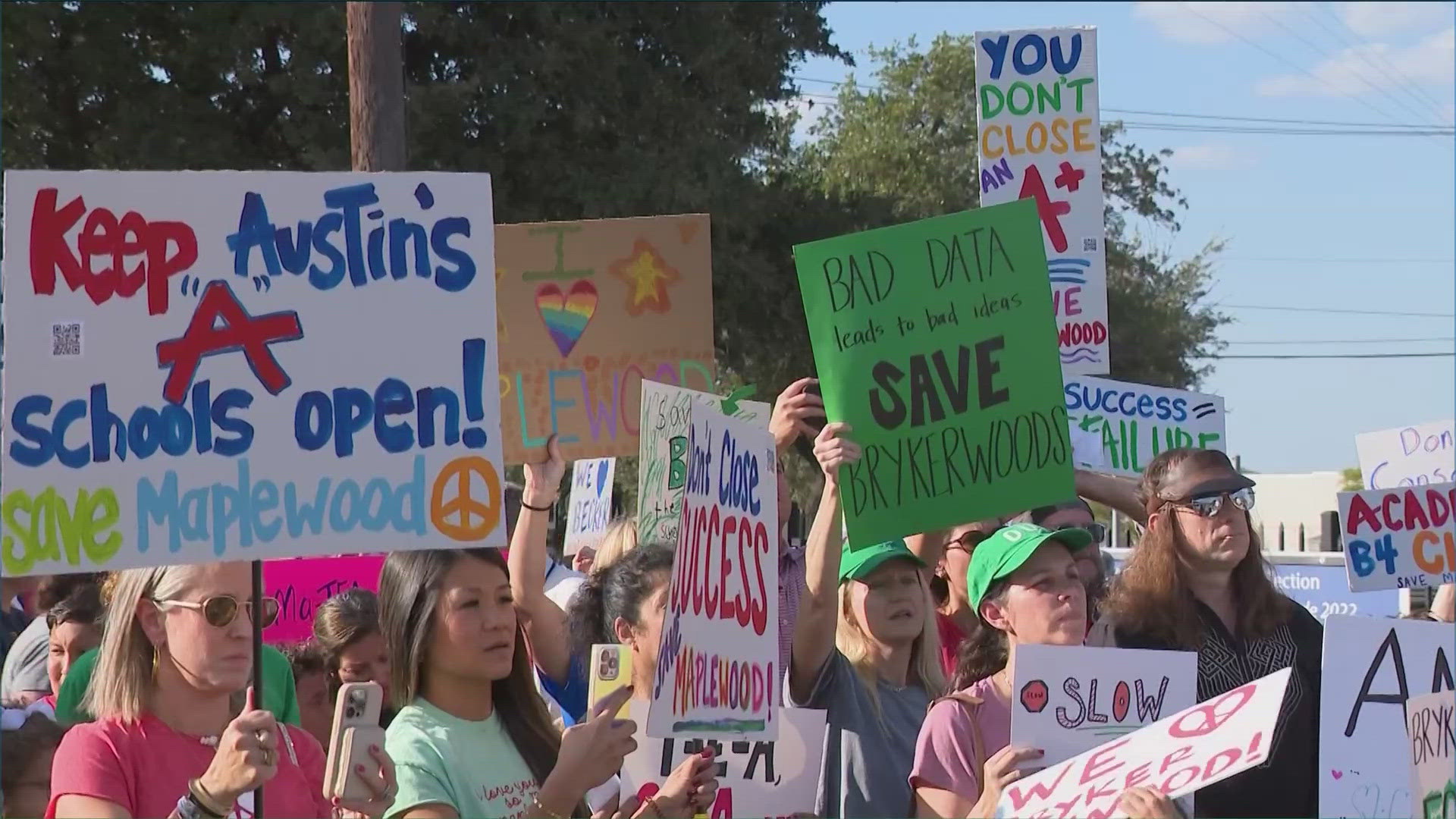 Families rally at Austin ISD headquarters to oppose school ...