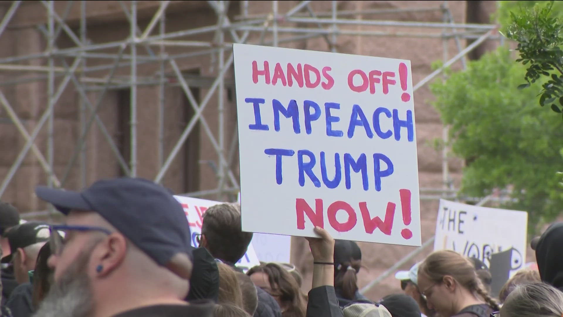 Protesters oppose President Trump, Musk at 'Hands Off!' rally at Texas ...