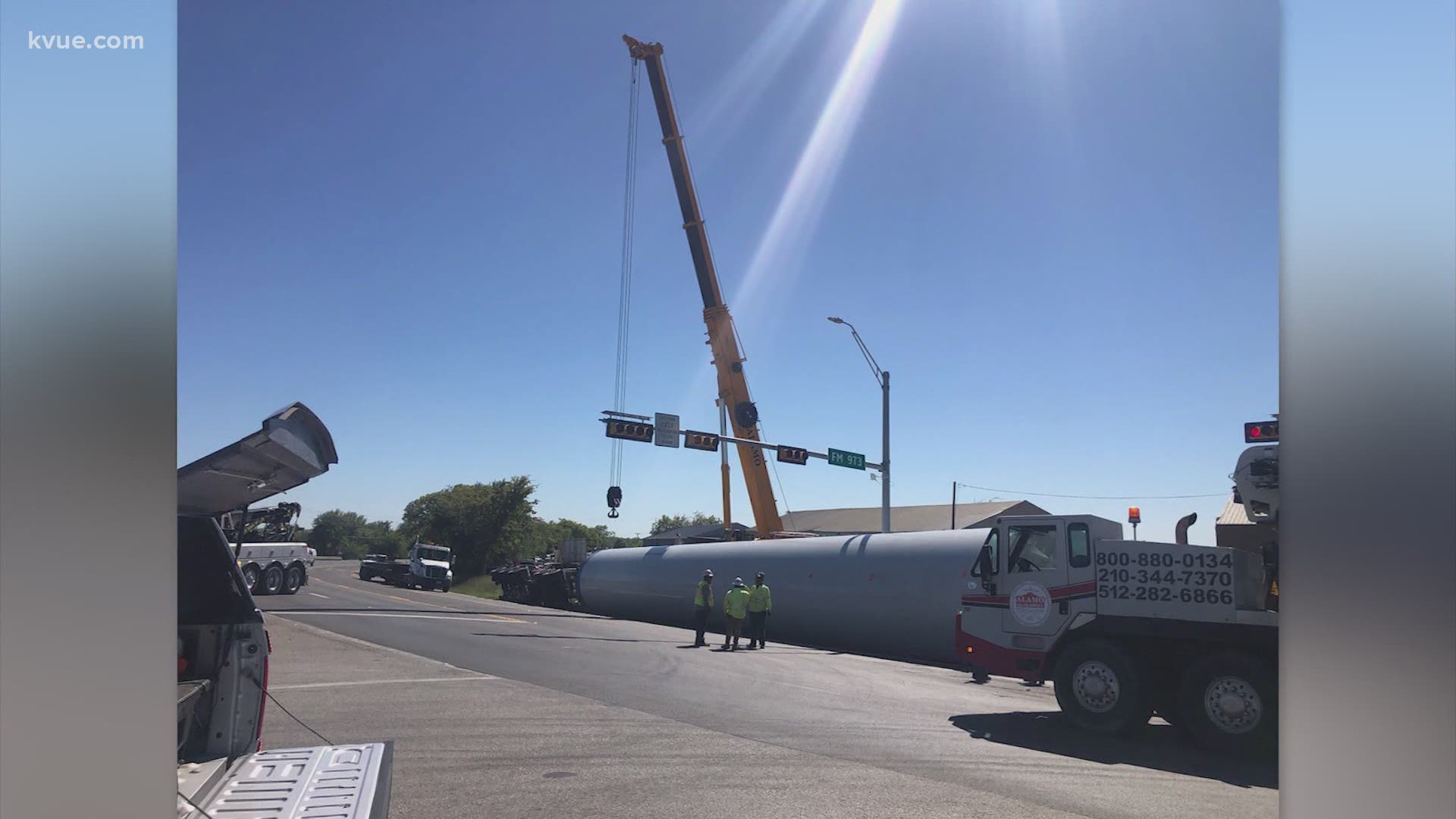 18-wheeler carrying wind turbine blade rolls over in Travis County ...