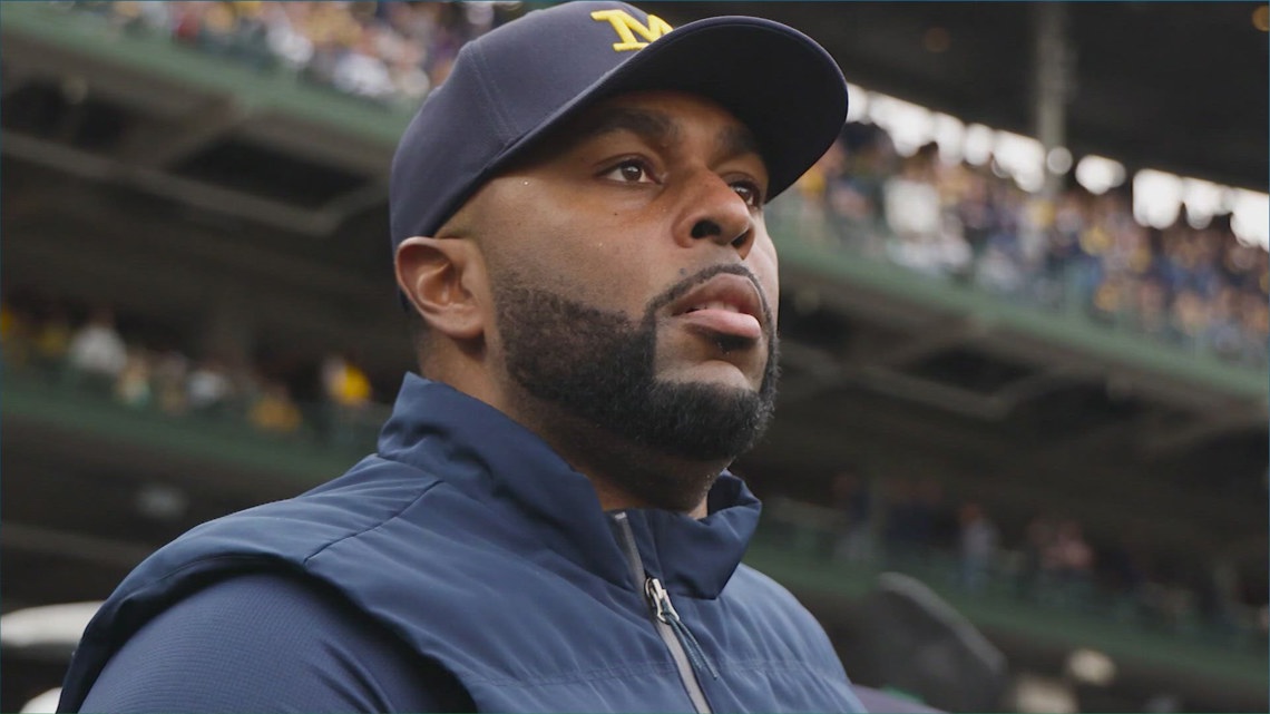 Former University of Michigan football coach fired, booked into jail ...