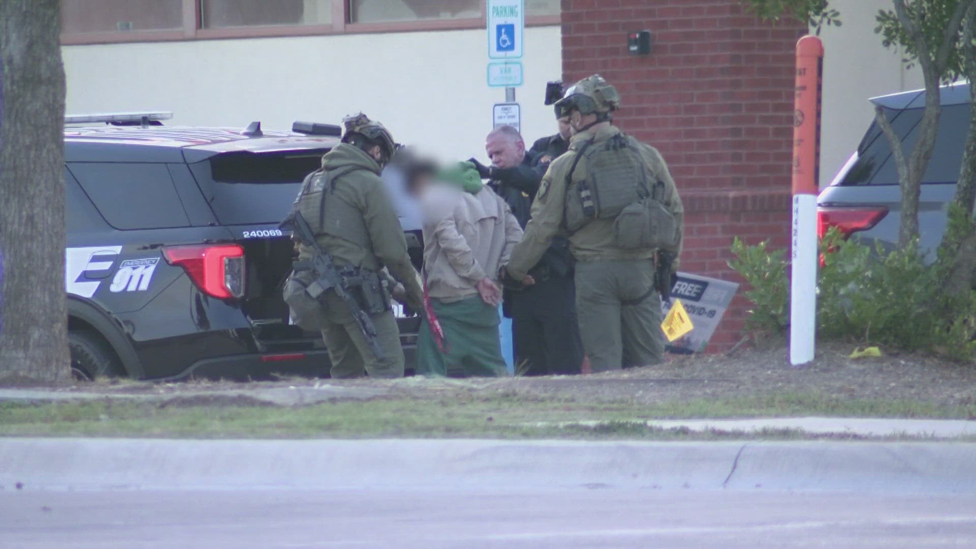 1 in custody after police say man barricaded himself inside a Round ...