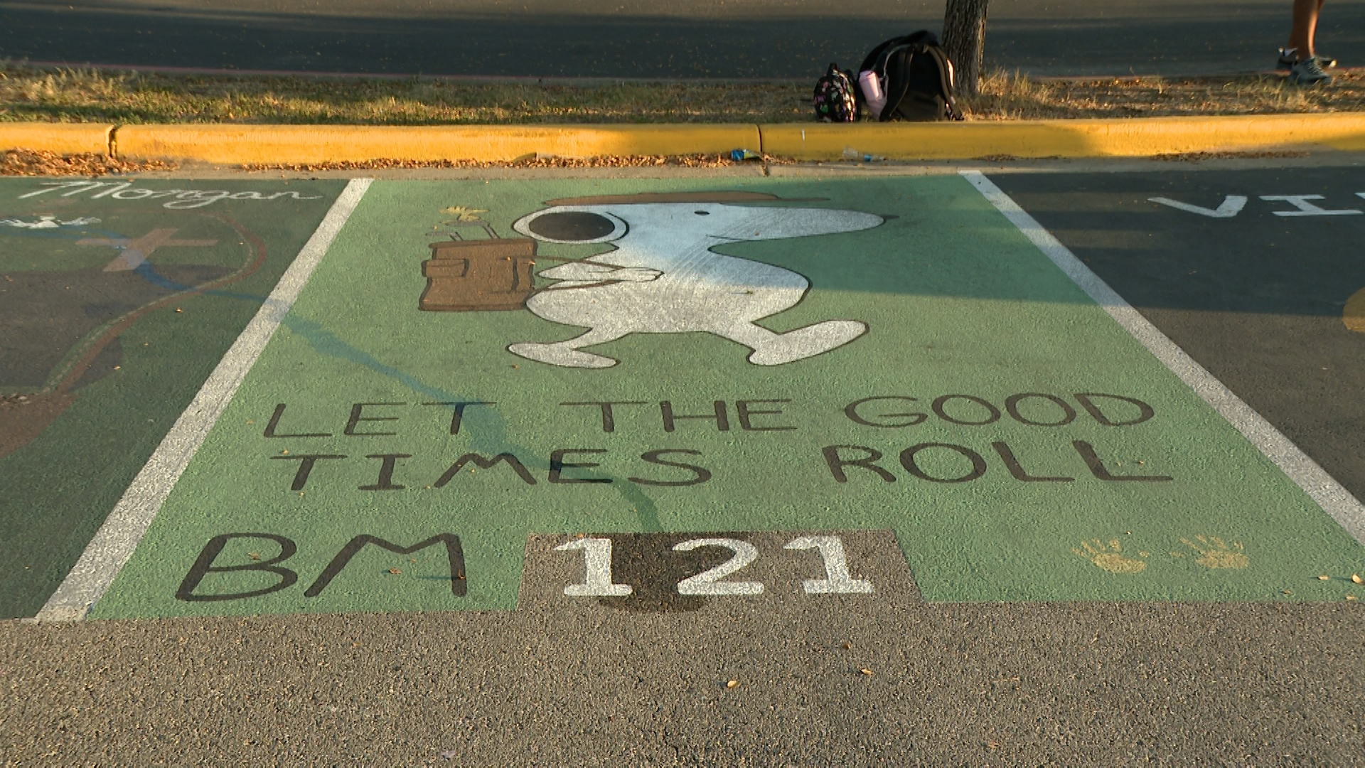 Round Rock High School seniors paint parking lot spaces | kvue.com