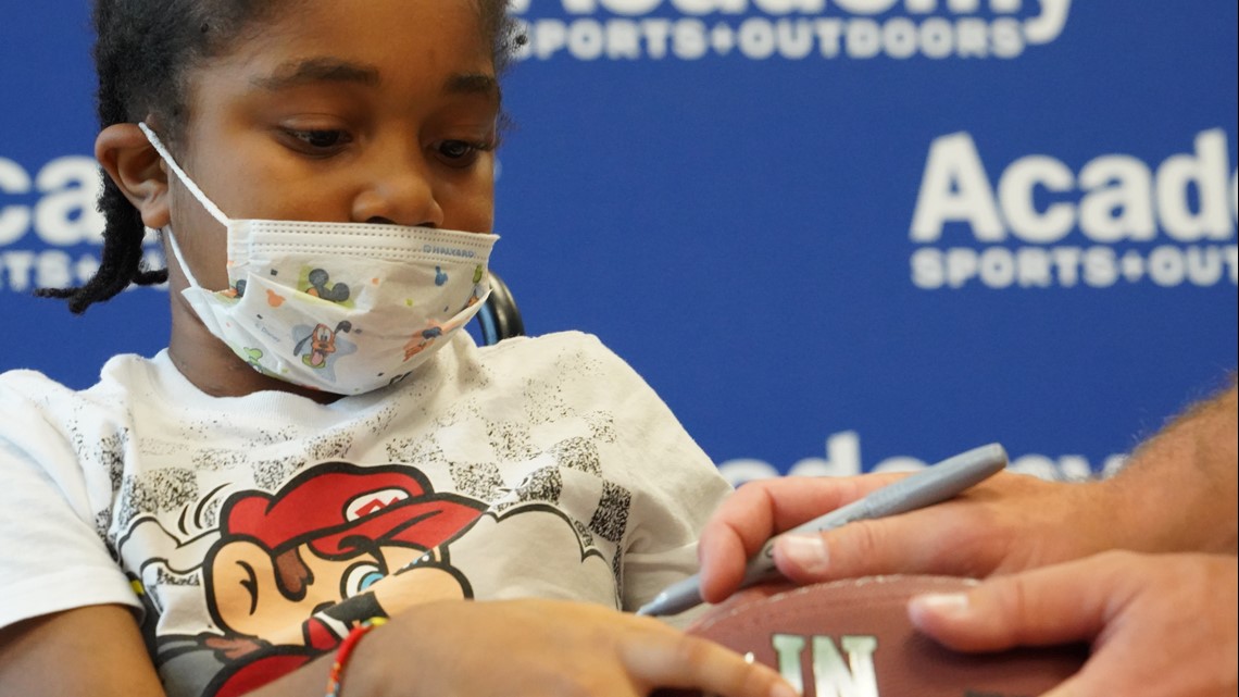 PHOTOS: Colt McCoy visits Dell Children's | kvue.com