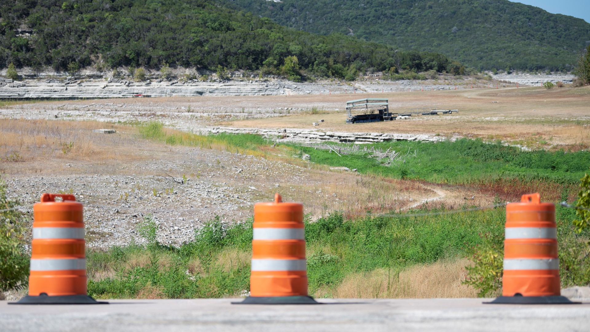 As July heat breaks records, Lake Travis water levels continue to drop ...
