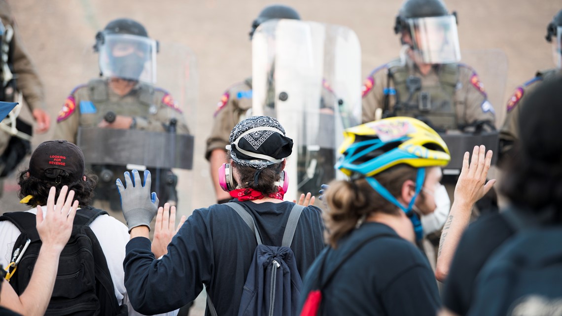 PHOTOS: Protesters march through Downtown Austin for seventh night in a ...