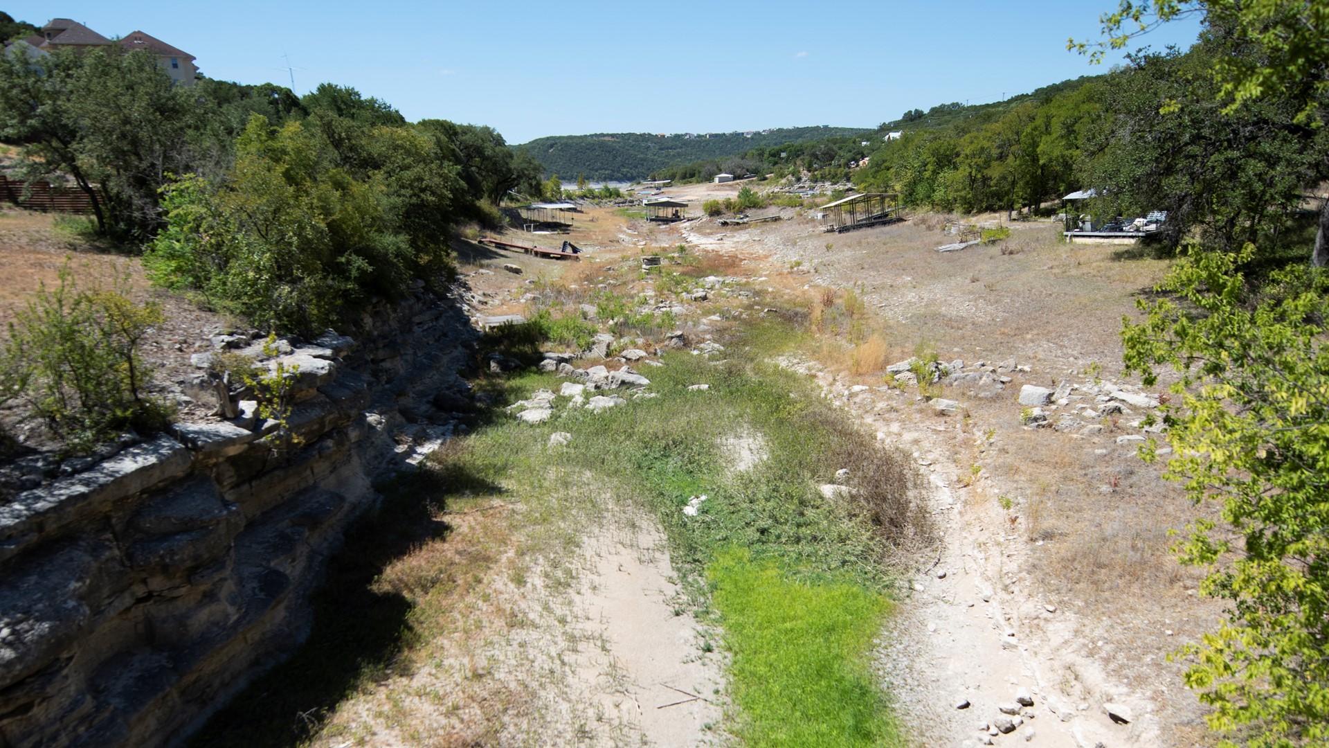 As July heat breaks records, Lake Travis water levels continue to drop ...