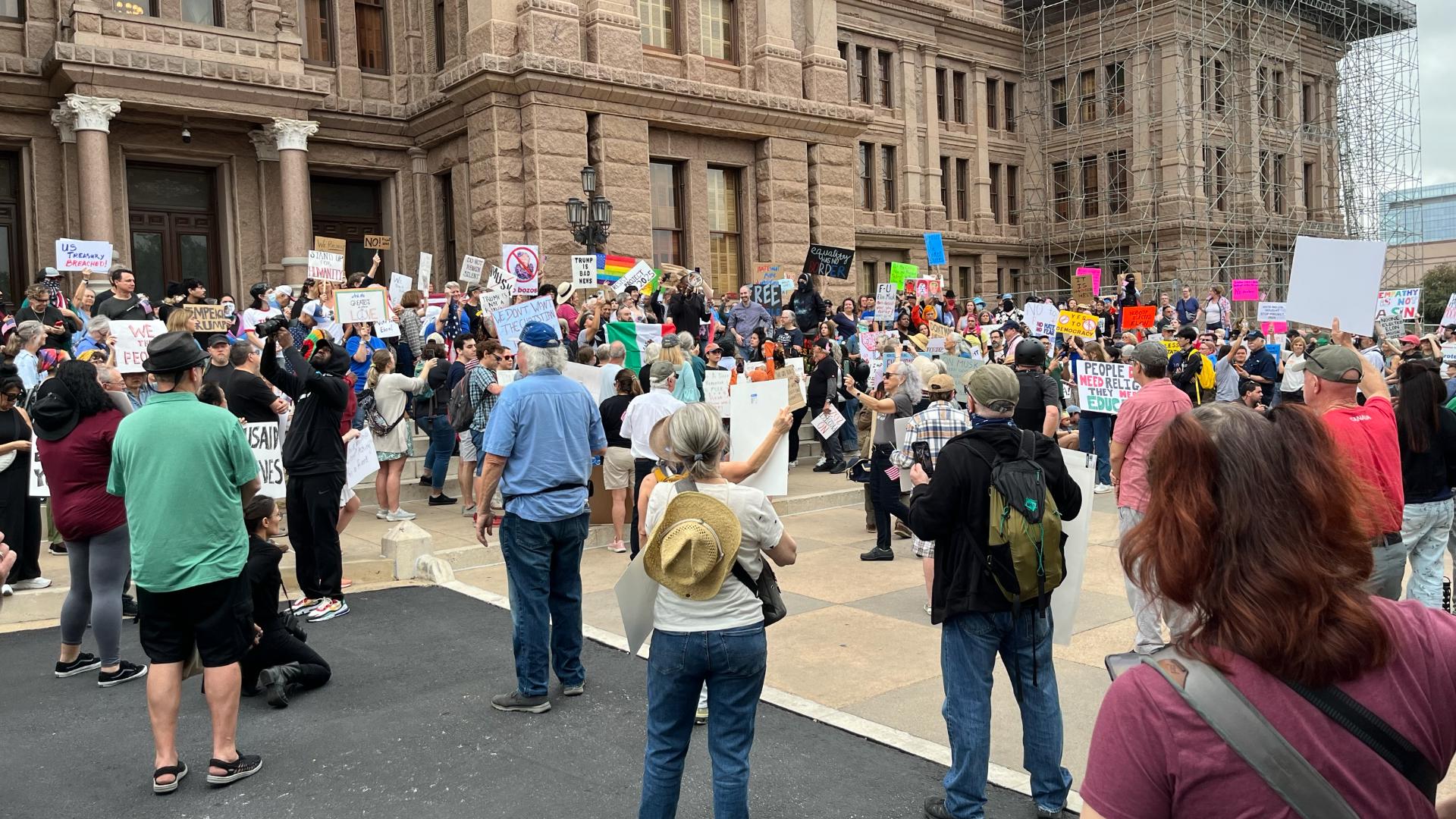 Protestors in Austin join national movement against Trump ...