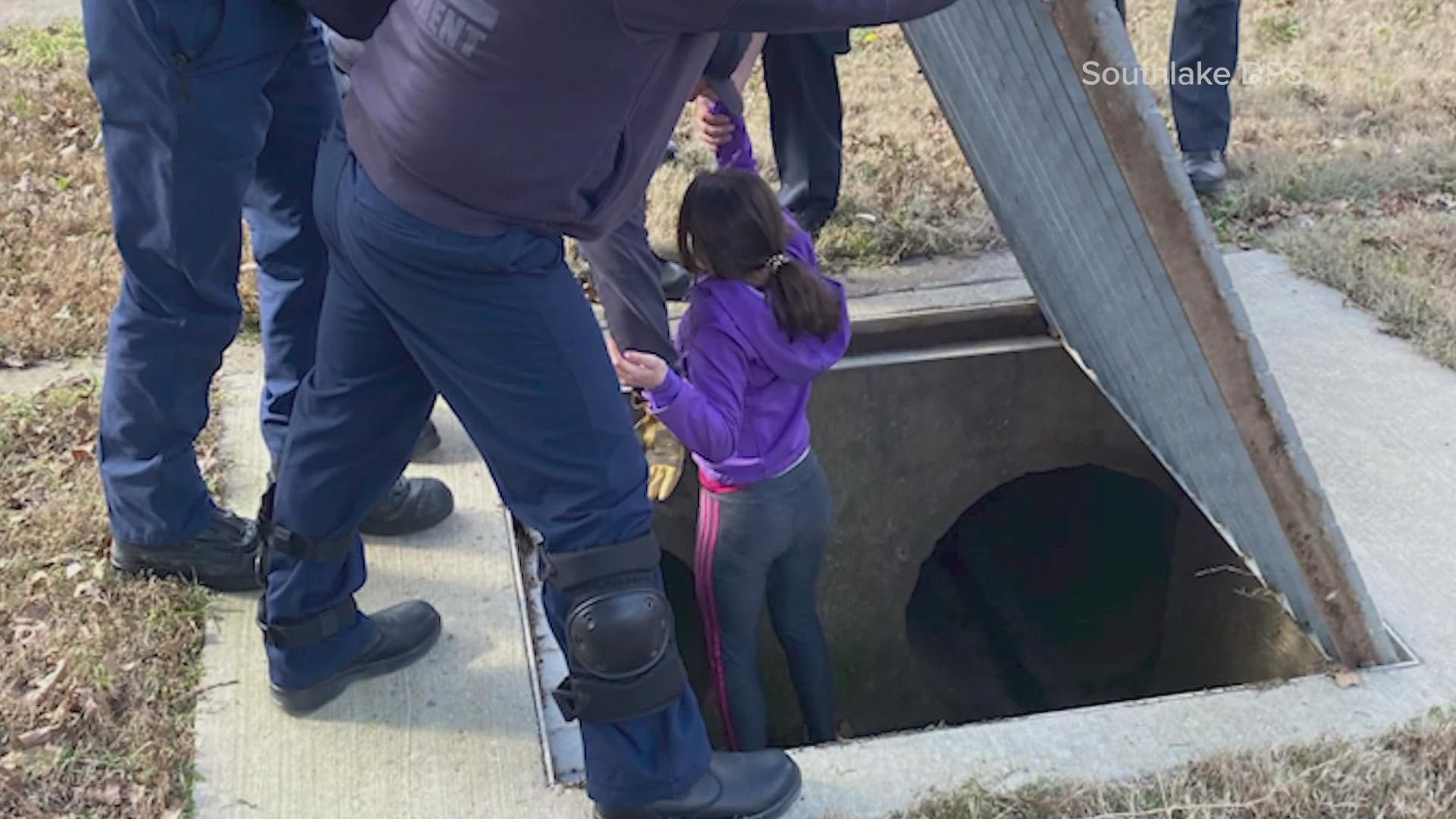 Girl rescued from drain pipe where she came face-to-face with 2 snakes ...