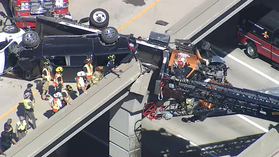 Truck hanging off overpass at US 75 and Highway 121 in McKinney | kvue.com